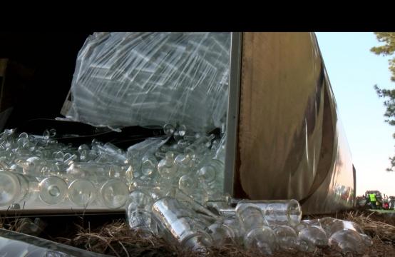 Shattered glass strewn across highway after semi hauling glass loses ...
