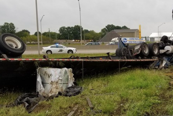 Driver killed after steel coils shift and overturn truck