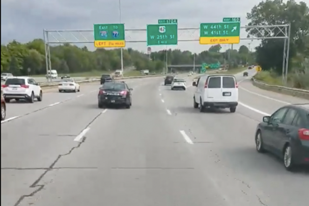 VIDEO: Trucker films Cleveland cop straddling two lanes