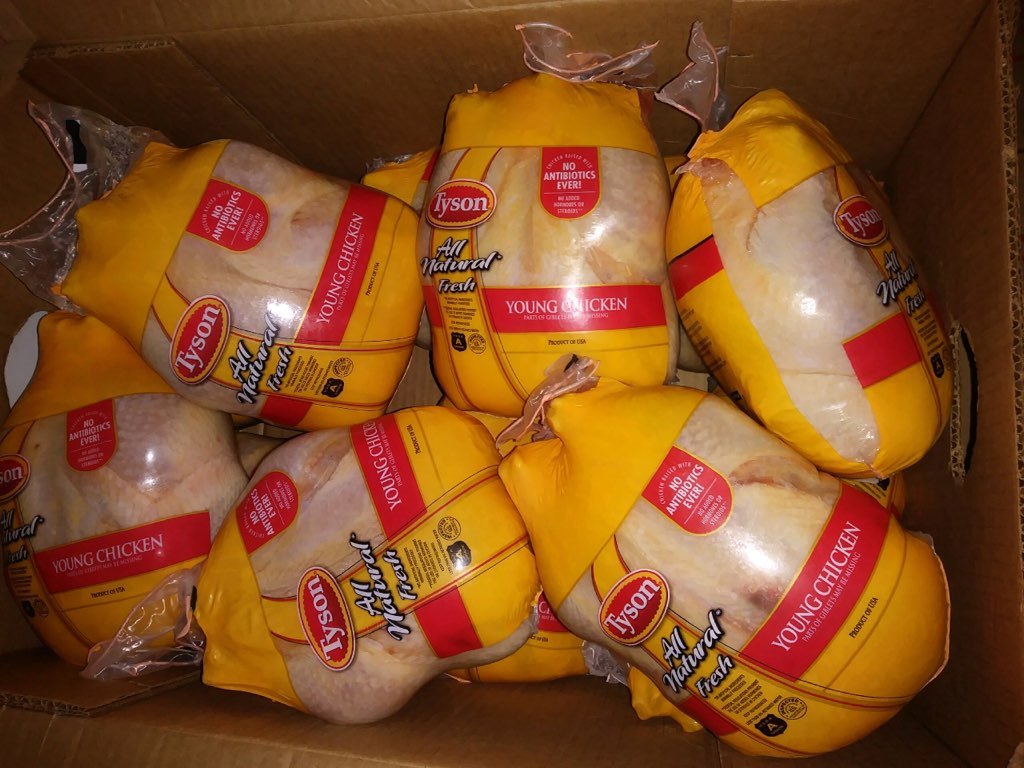 Trucker teams up with cops to donate 3/4 of a ton of chicken to hungry ...