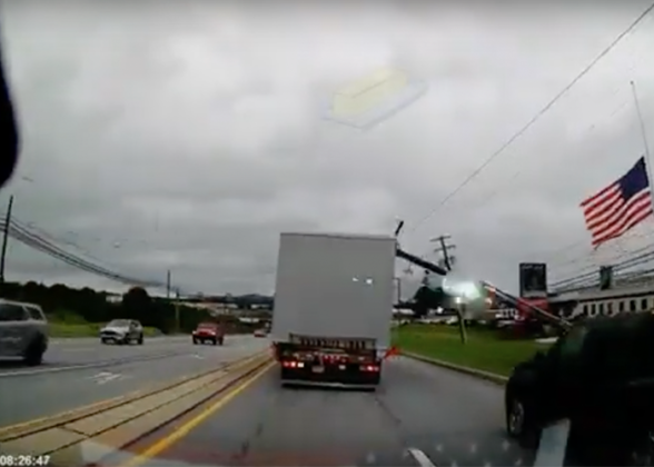 Oversized load takes down power poles in dash cam video
