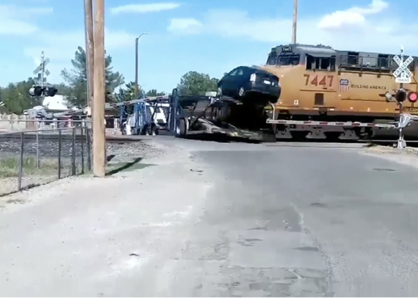Prius Goes Flying After Car Hauler Gets Hammered by Train