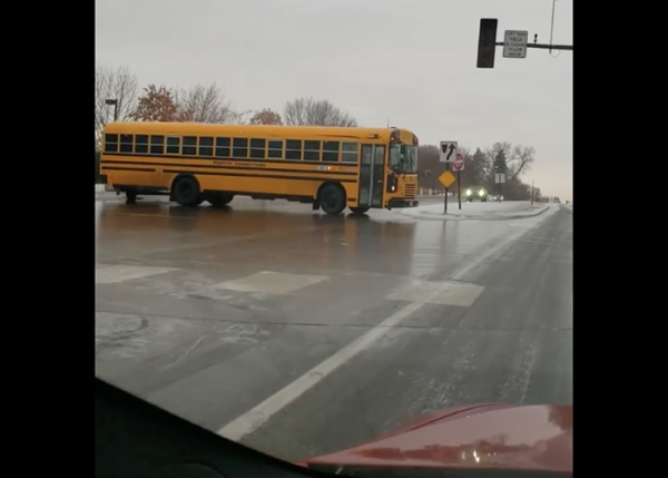 School bus slides sideways through intersection in scary video