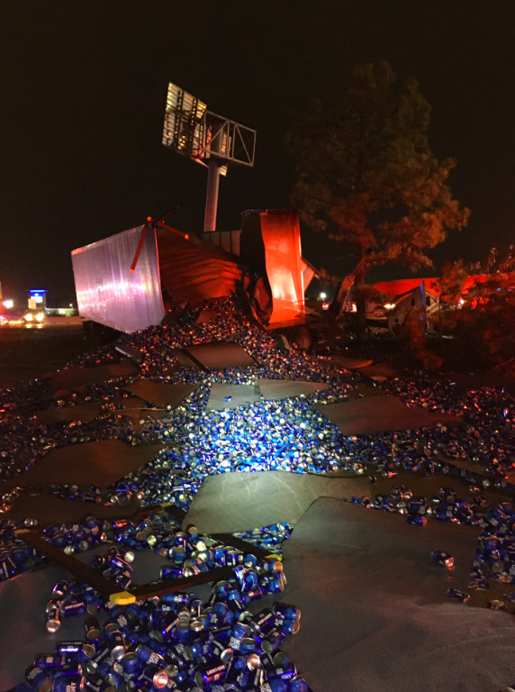 Trucker hauling beer cans ejected in fatal crash