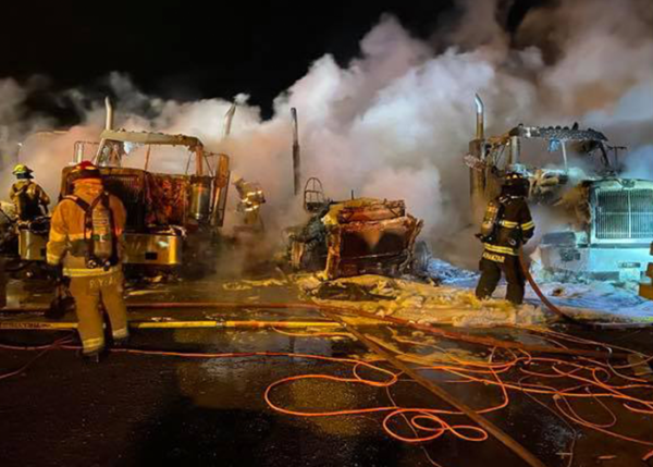 Seven semis heavily damaged in overnight truck yard fire
