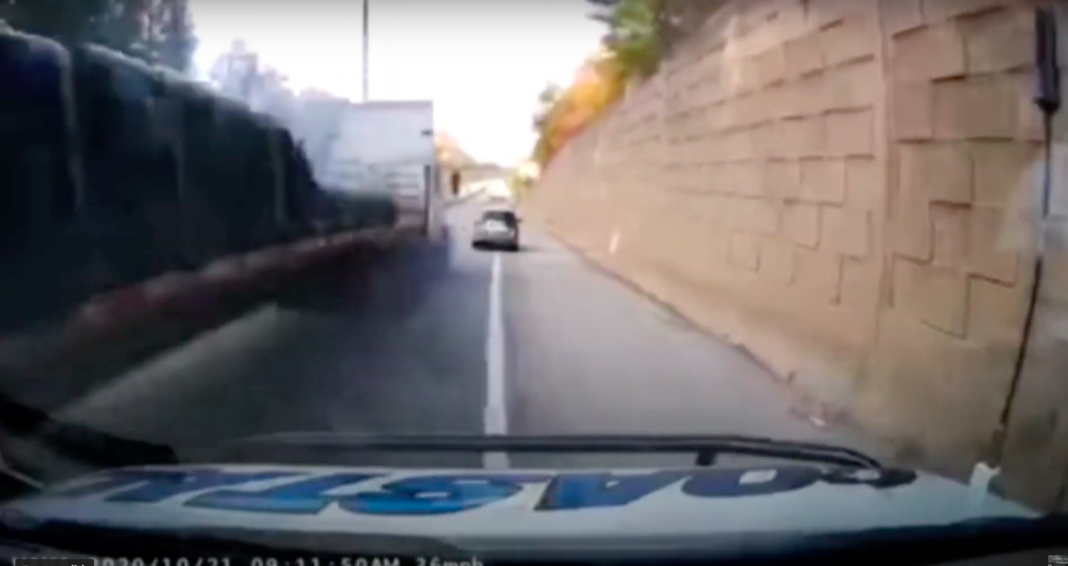 Road crew nearly wiped out by semi in shocking close call caught on ...