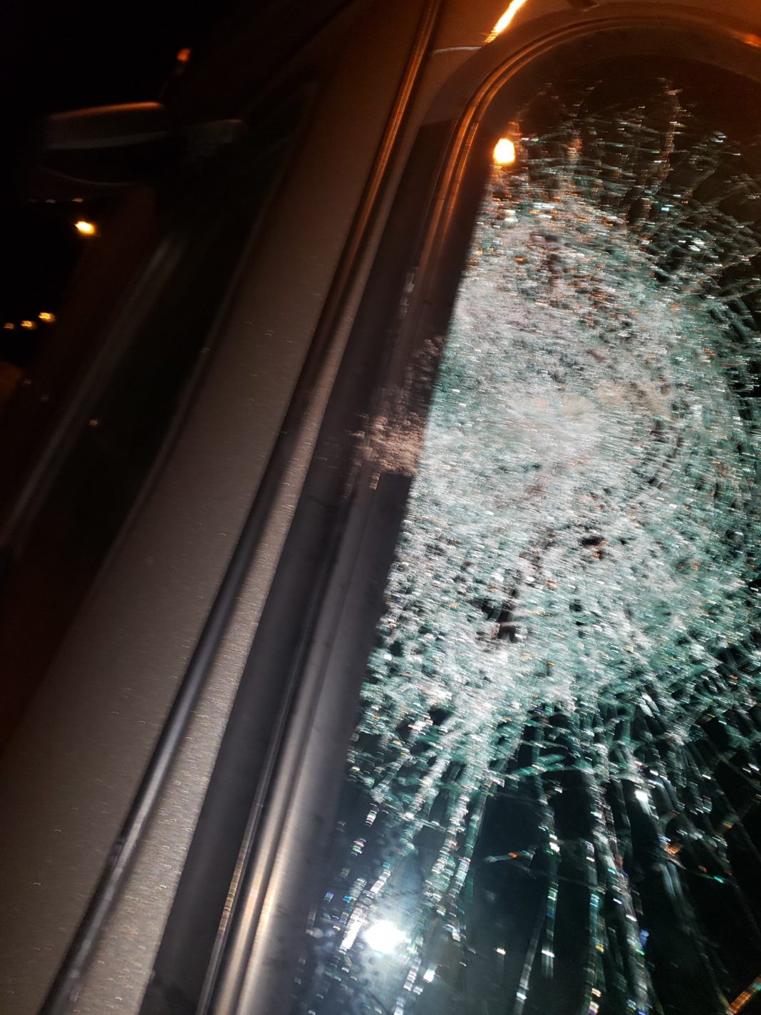 Trucker's dash cam captures the moment his windshield is shattered by a ...