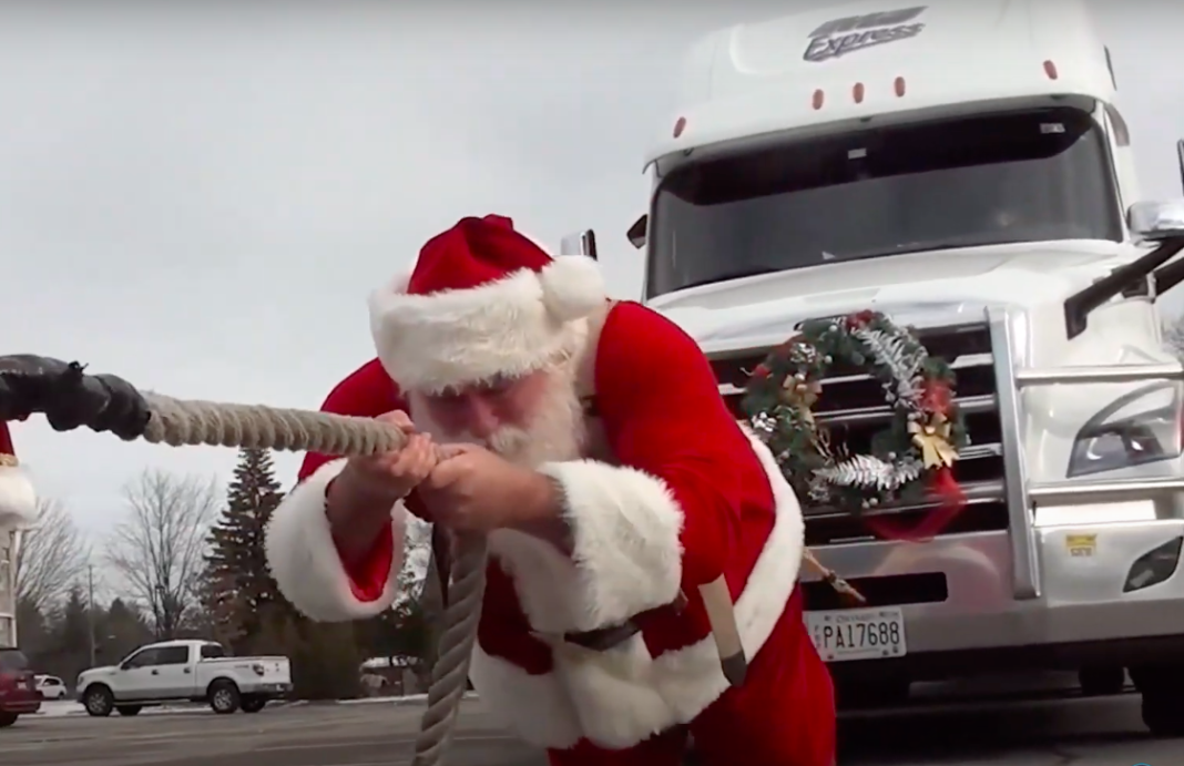 VIDEO: Pastor in Santa suit earns Guinness World Record for pulling 36K ...
