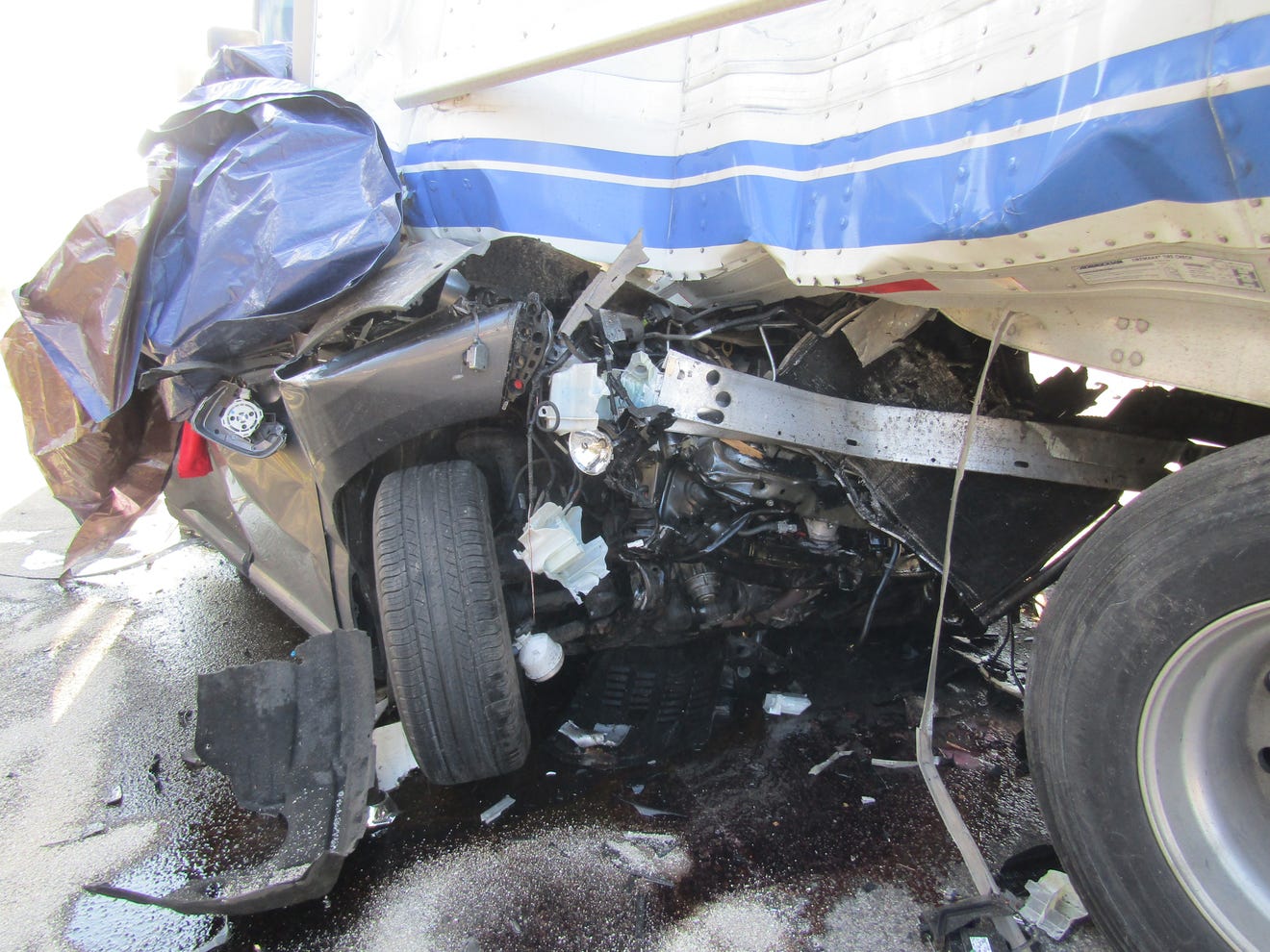 “Erratic” police chase ends with car fatally sandwiched between two semis