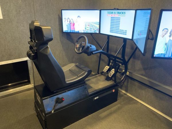 Driving simulator teaches teens how to safely share the road with semi ...