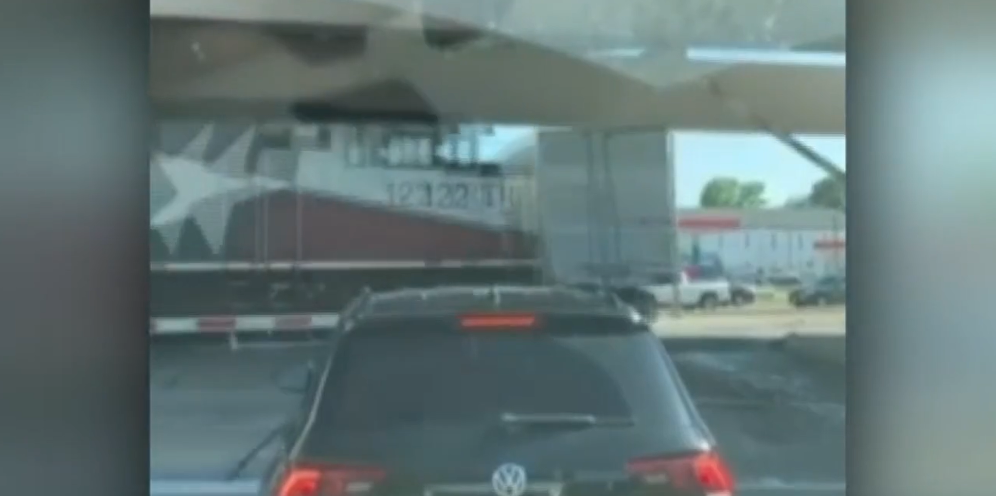 Watch as this trucker tries (unsuccessfully) to beat an oncoming train Watch as this trucker tries (unsuccessfully) to beat an oncoming train