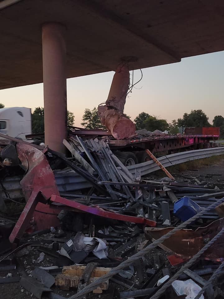 Driver seriously hurt in bridge crash that obliterated rig