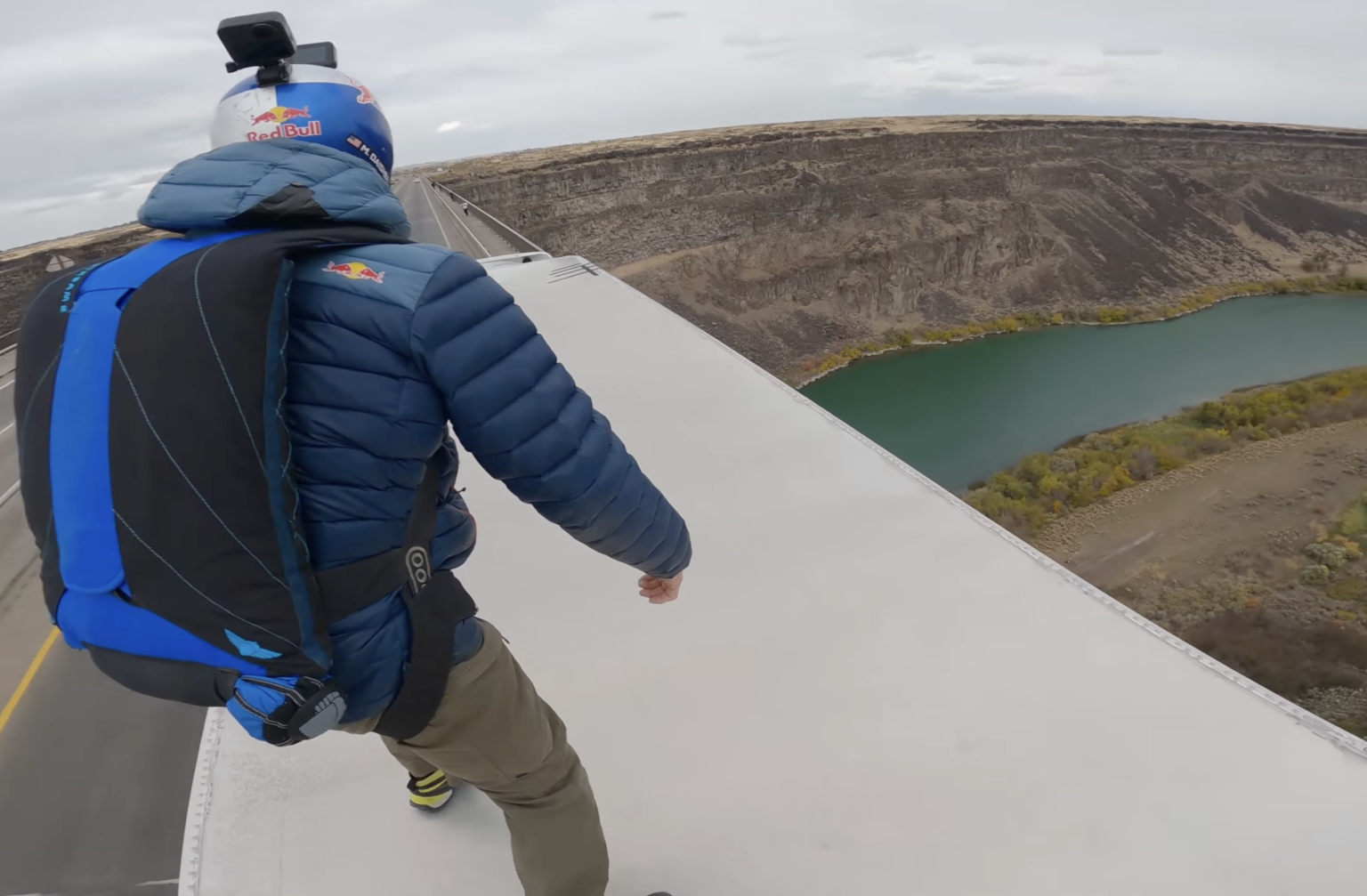 Watch these base-jumpers leap from a moving semi truck