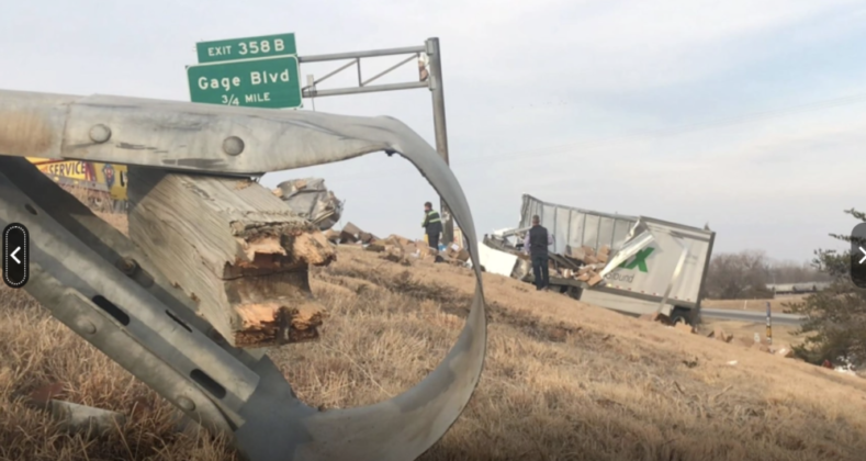 Packages strewn across highway shoulder after double-trailer crash
