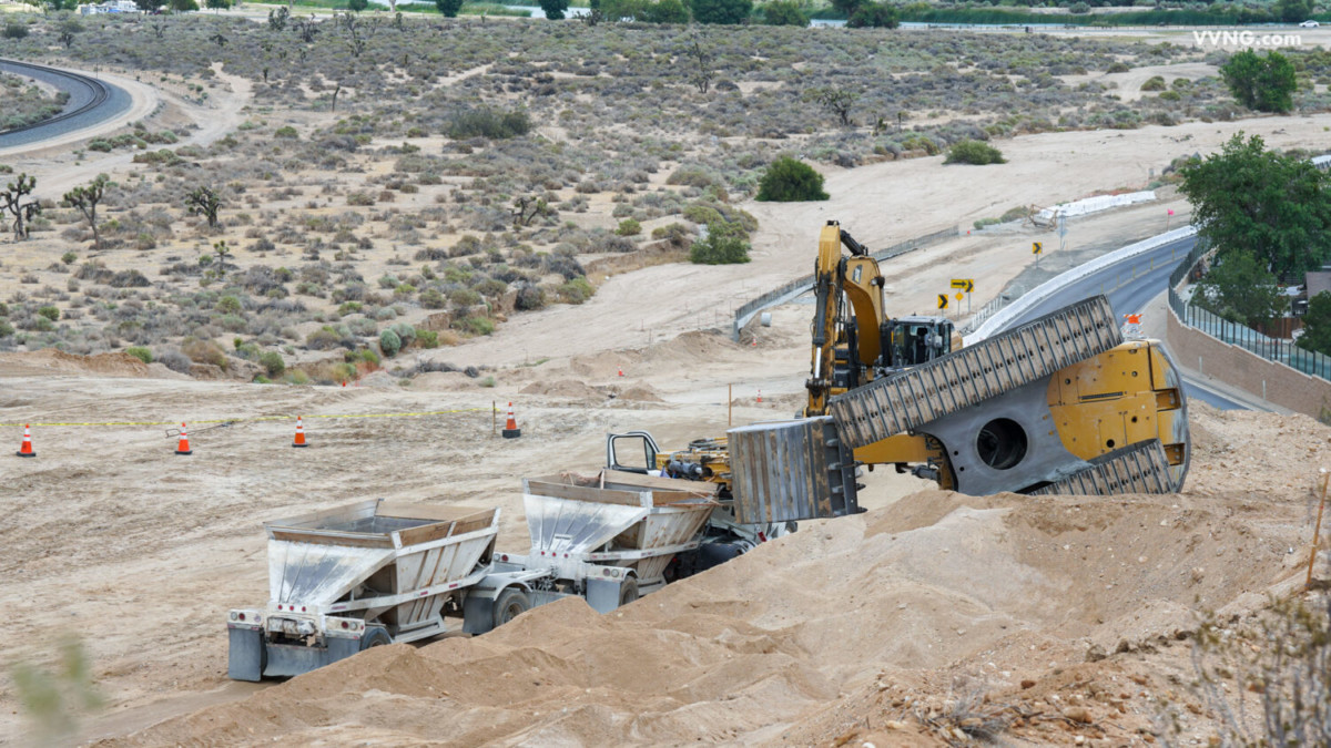 Driver crushed by falling excavator at construction site