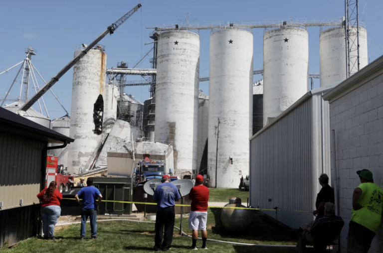 Man buried in grain silo collapse while unloading semi truck