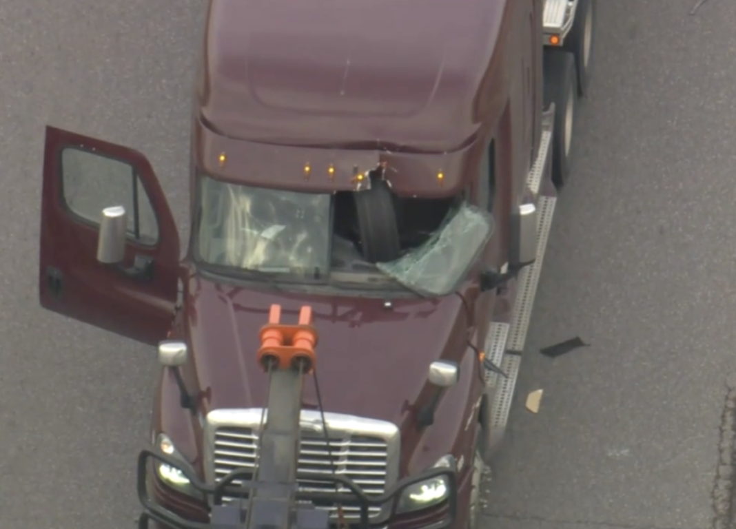 Truck driver hurt when pickup tire comes flying in through windshield
