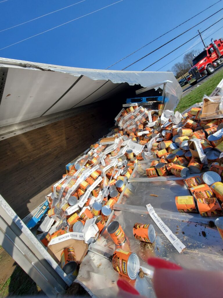 Big rig crash spills more than 1000 cans of Bush's Baked Beans