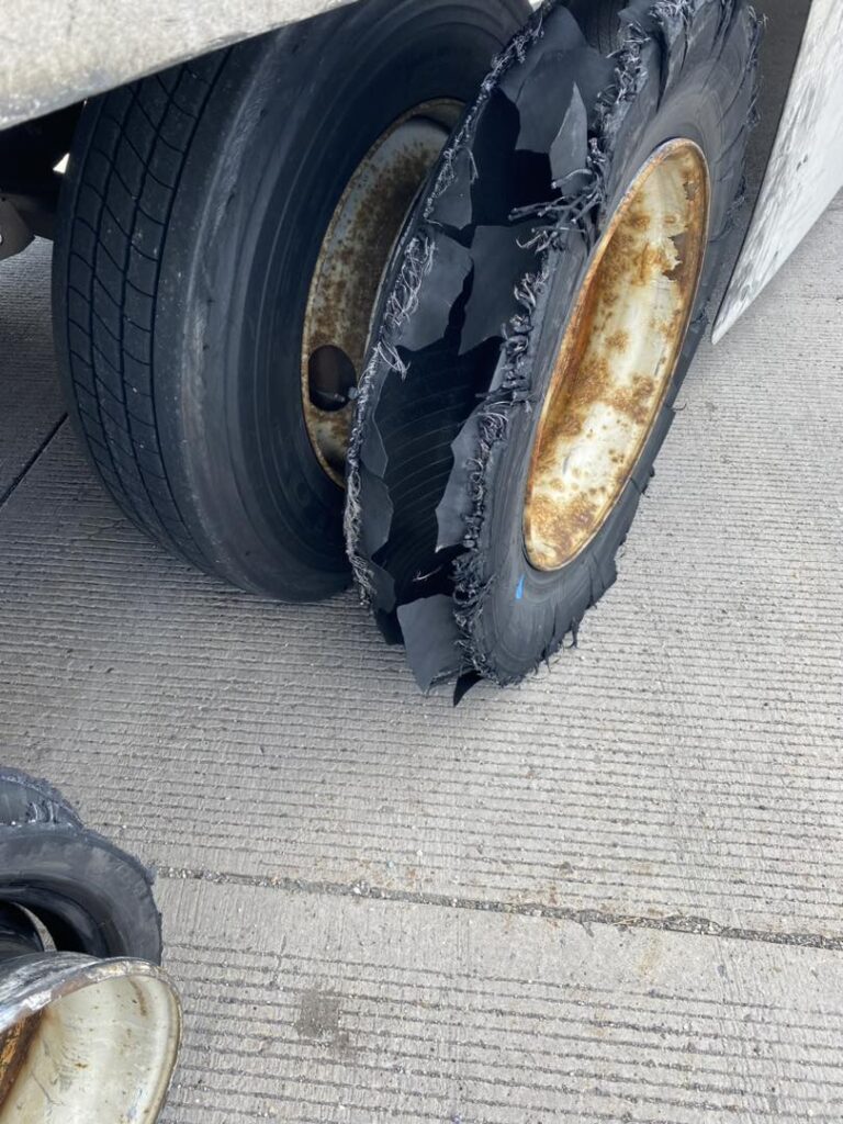 Truck's 'significant tire damage' results in citation, Out of Service order