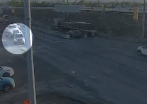 Traffic cameras capture car cutting off dump truck seconds before it ...
