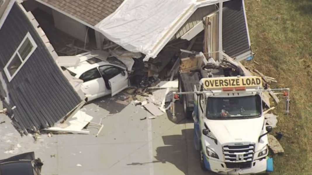 Multiple cars squashed beneath mobile home in semi truck crash