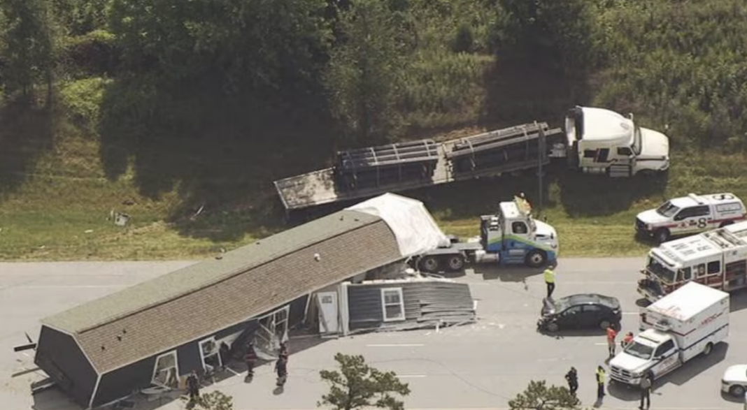 Multiple cars squashed beneath mobile home in semi truck crash