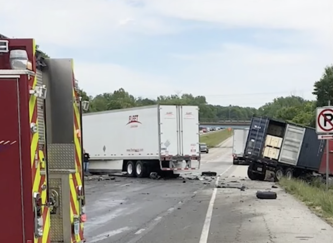 Three rig, four car crash claims life of one