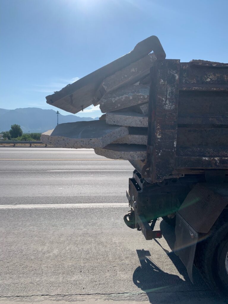 Dump truck driver sidelined for unsafe concrete slab haul