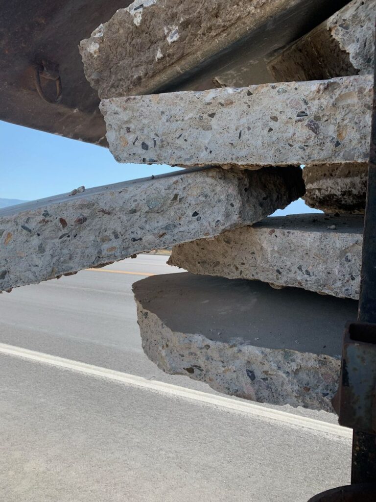 Dump truck driver sidelined for unsafe concrete slab haul