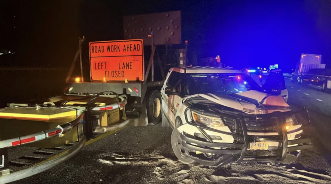 Cruising police officer struck from behind by tractor trailer in work zone