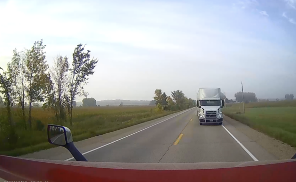 Truck driver crosses over center line, totals both rigs in this video