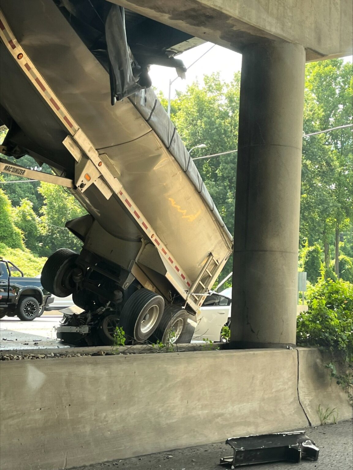 One hospitalized after commercial vehicle strikes bridge, car strikes ...