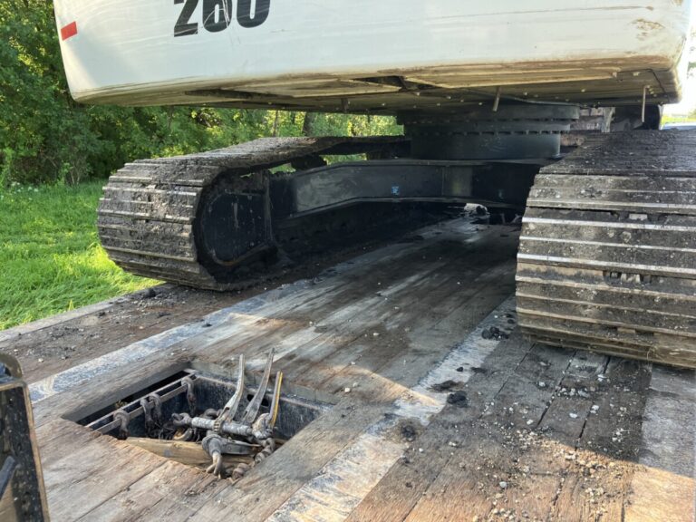Iowa troopers spot heavy equipment haul with 'no form of securement'