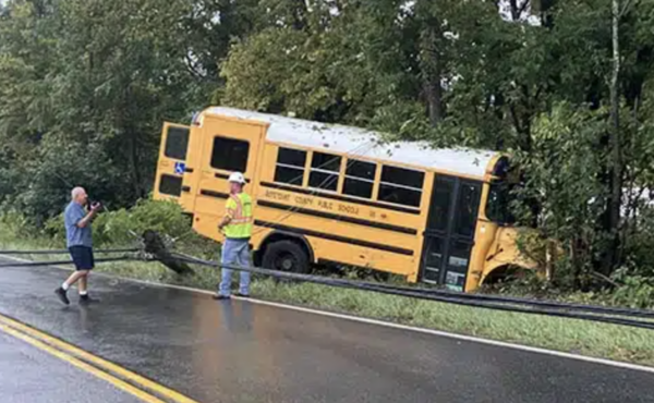 Wrong-way CMV forces school bus off road then flees