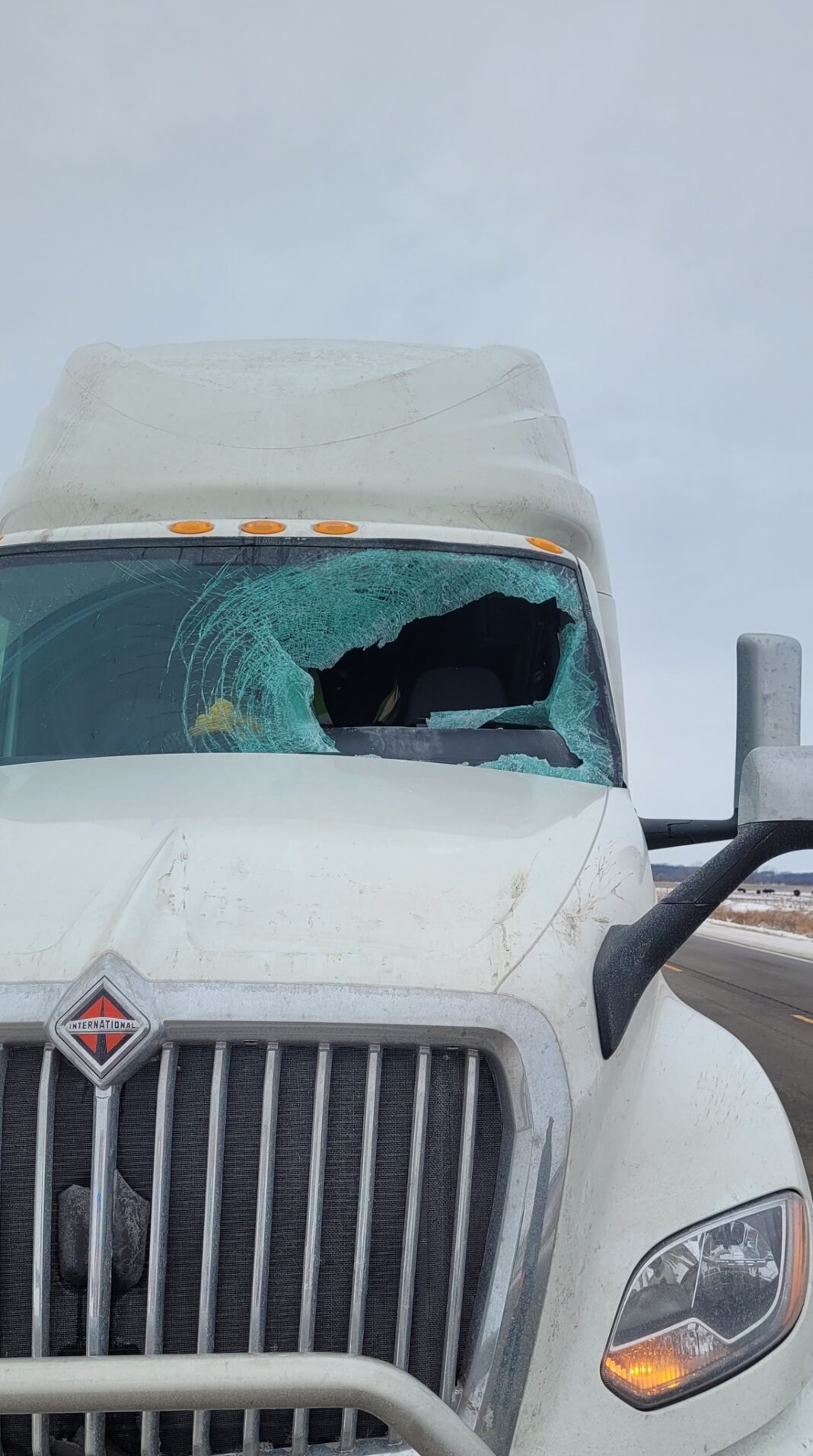Dash cam shows semi's windshield absolutely obliterated by ice chunk ...