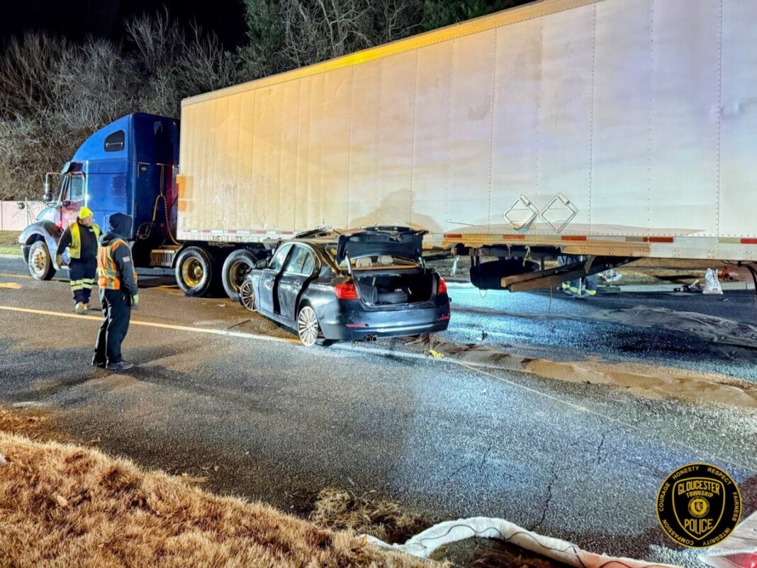 Sedan 'illegally passing' semi truck gets wedged underneath trailer ...