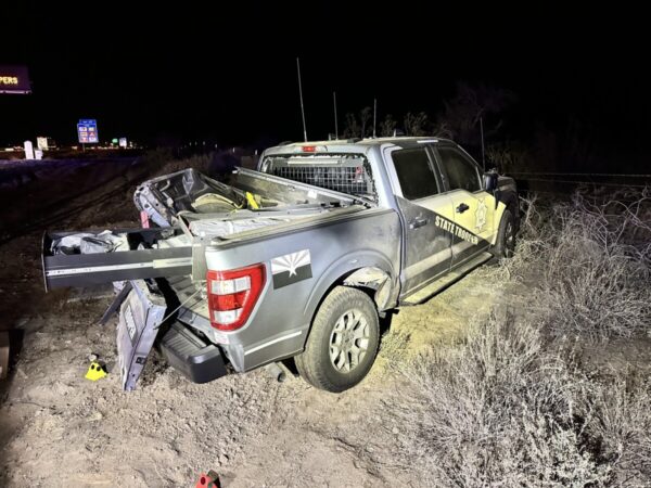Pickup hauling three cars plows into Arizona trooper's cruiser parked ...
