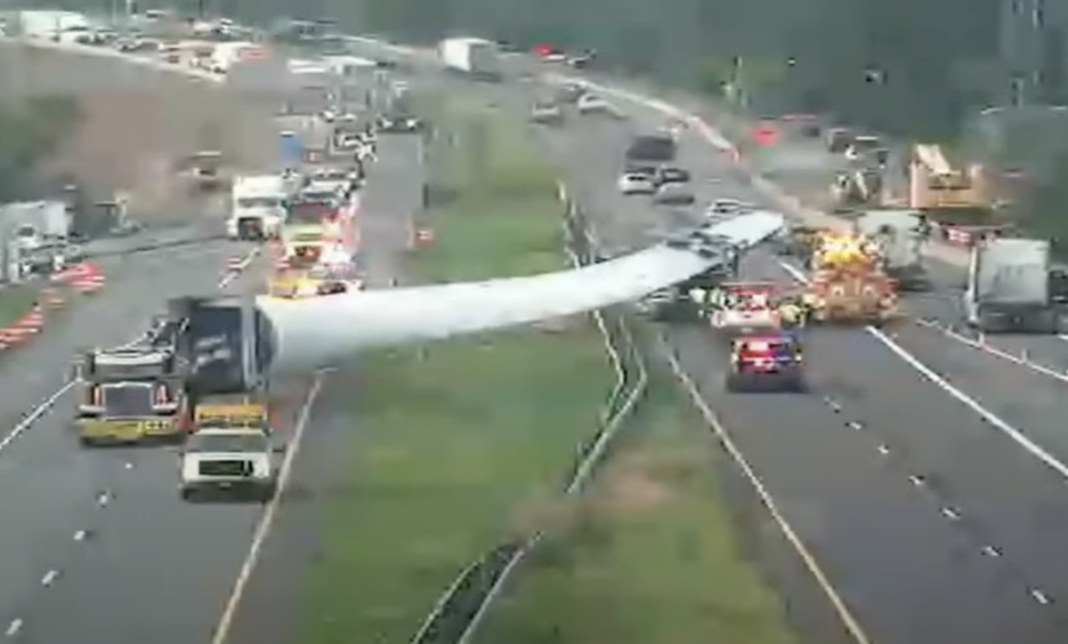 Windmill turbine blade comes loose during transport, injuring one