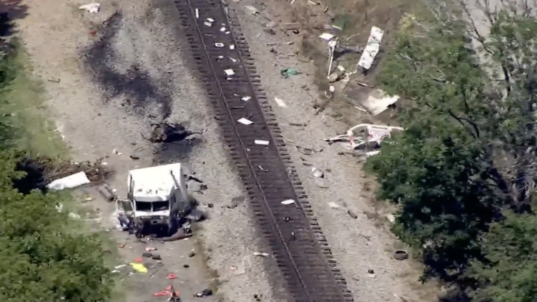 All expected to survive train crash that ejected person in semi truck ...