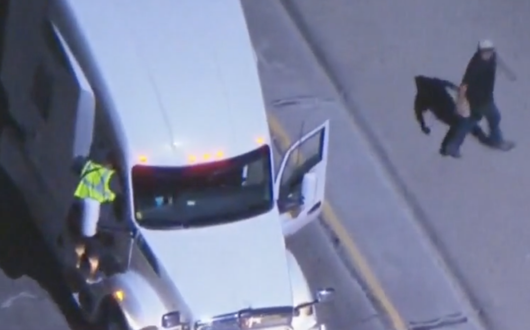 Two men carjack semi truck during televised police chase in LA