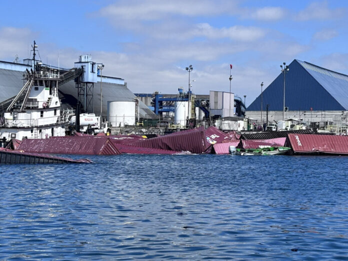 Video catches the moment that 67 shipping containers fall off ship into ...