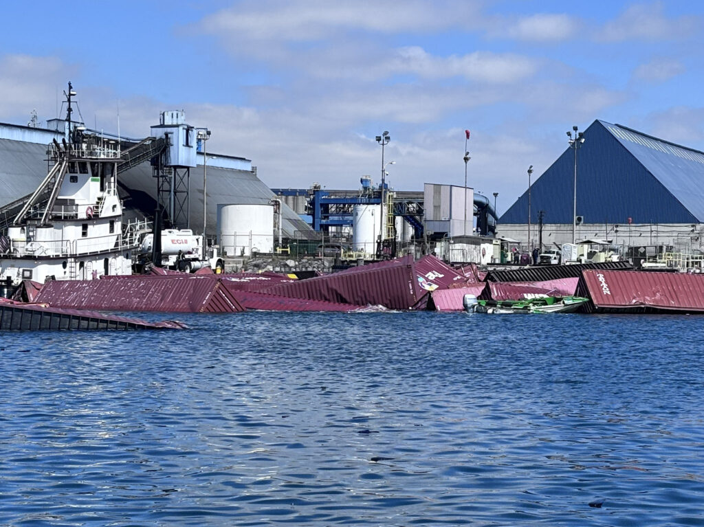 Video catches the moment that 67 shipping containers fall off ship into ...