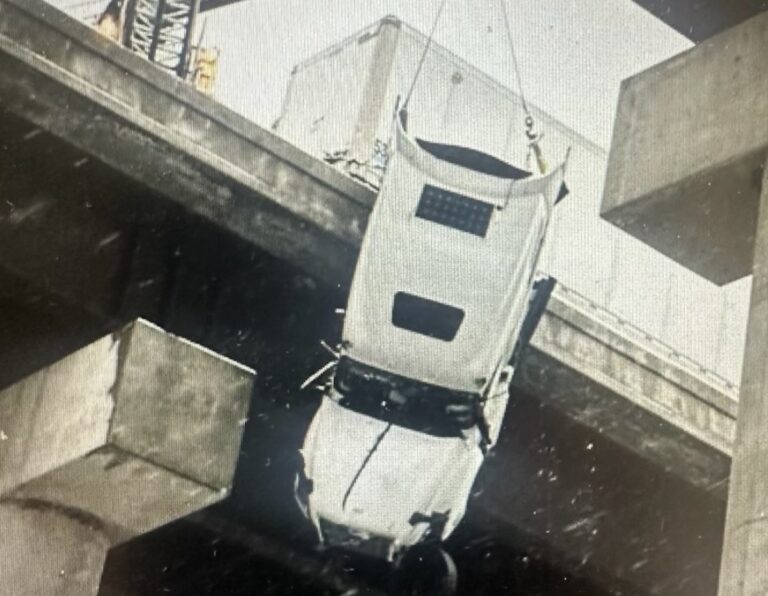 Trucker rescued after five hours stuck in cab dangling off WVa bridge