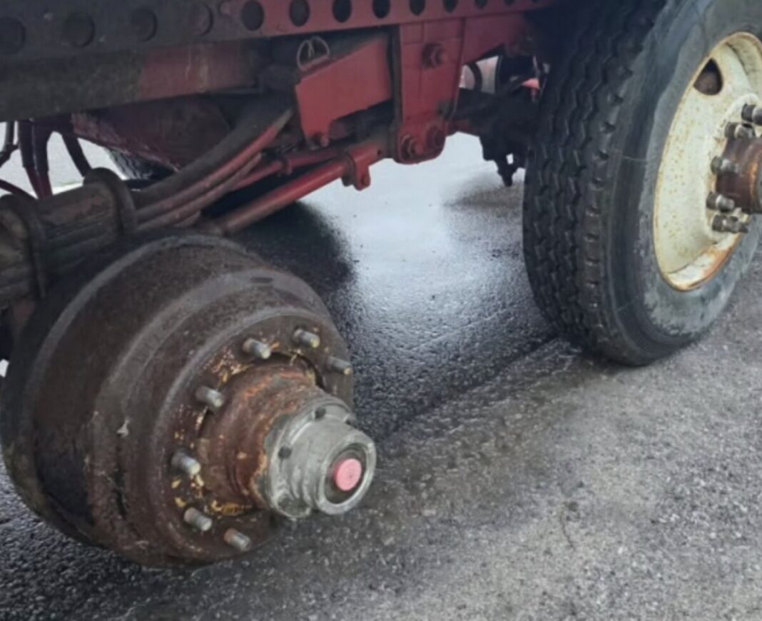 Police stop semi trailer headed to scrap yard for missing 10 wheels